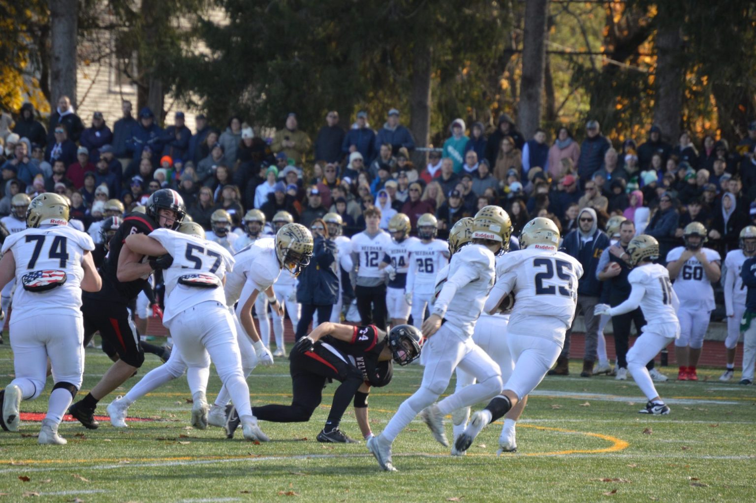 Scenes from Wellesley-Needham High School football game on Thanksgiving ...
