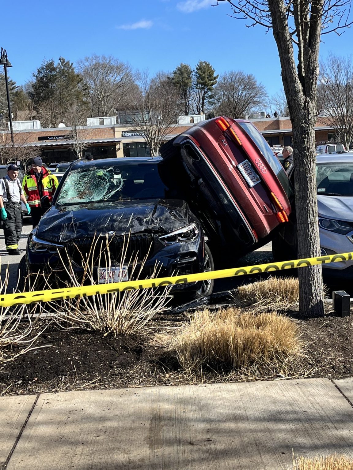 Car sandwiched between 2 others in Wellesley Roche Bros. parking lot ...